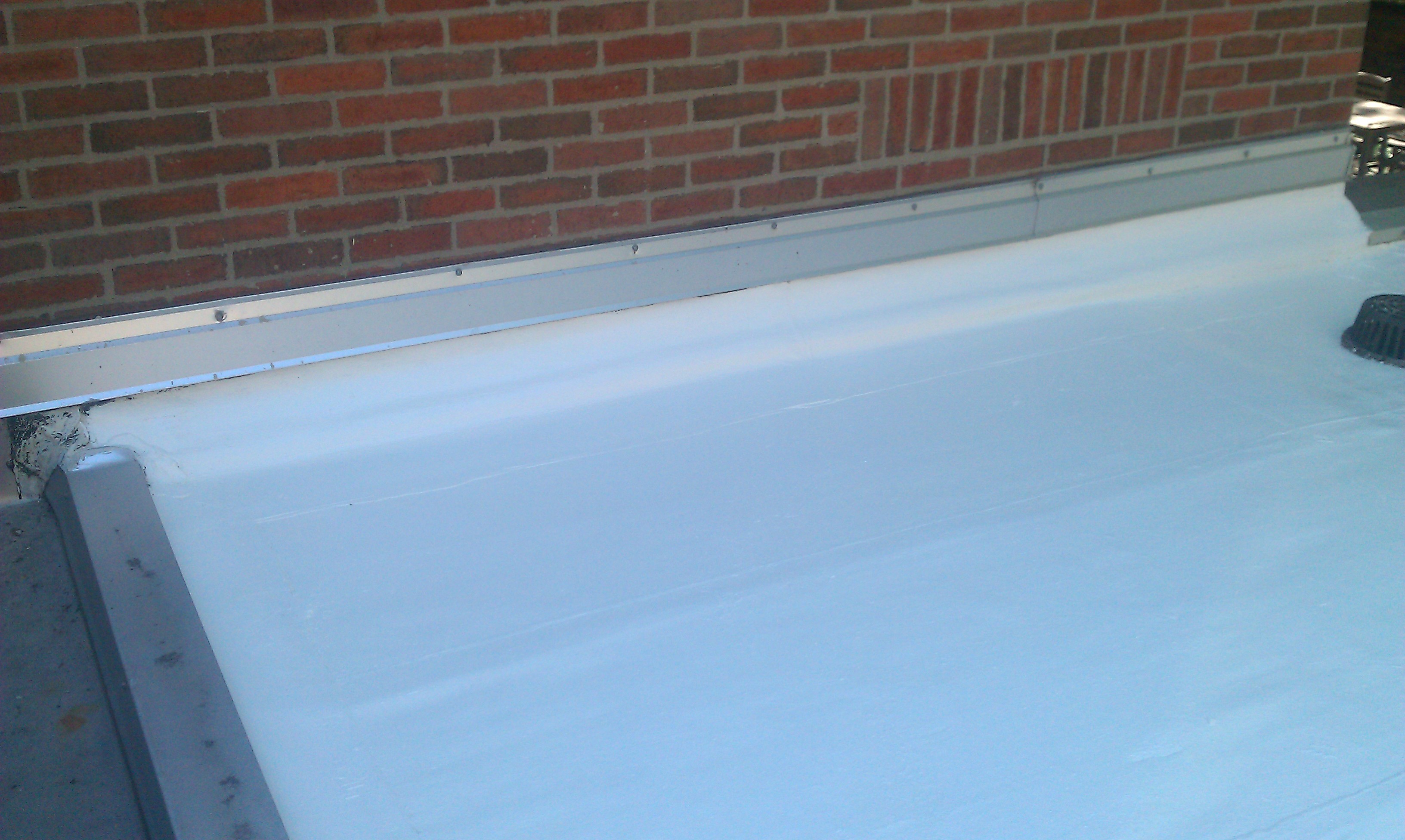White Roof Coating - Holman Nachtwey Co, Inc