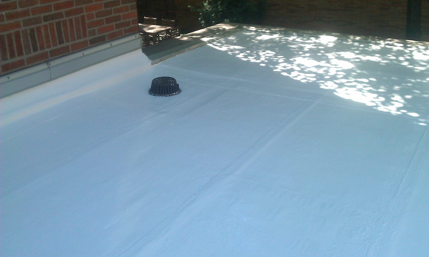 White Roof Coating - Holman Nachtwey Co, Inc